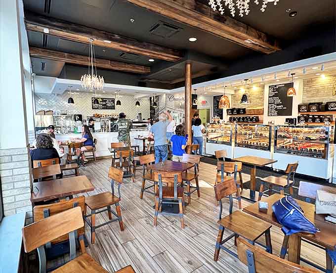 Rustic wooden beams meet modern design in this light-filled sanctuary where pastry dreams come true and diet resolutions go to die.