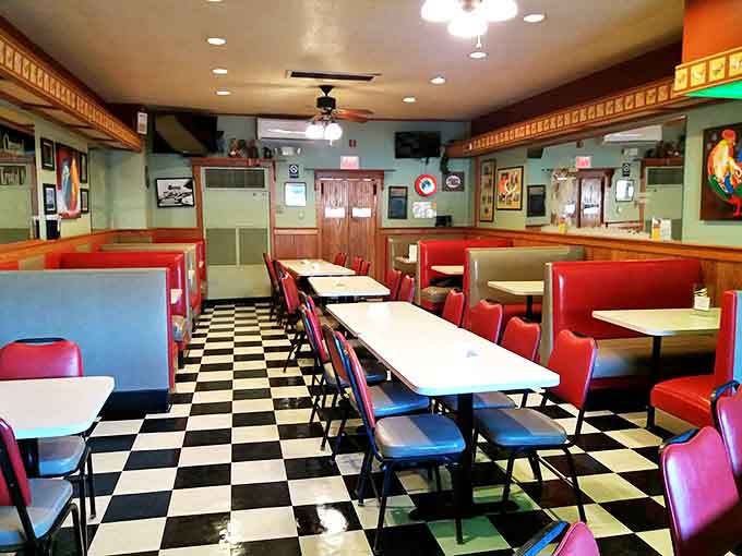 Classic black and white checkered floors meet cherry-red vinyl booths in this diner where time seems to stand deliciously still.