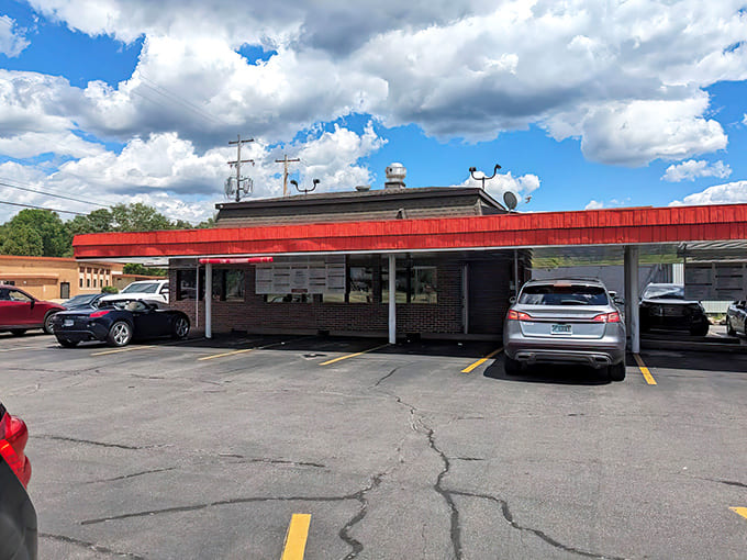 Classic car-hop service lives on at Rudy's, where the parking area transforms ordinary meals into time-travel experiences with every visit.