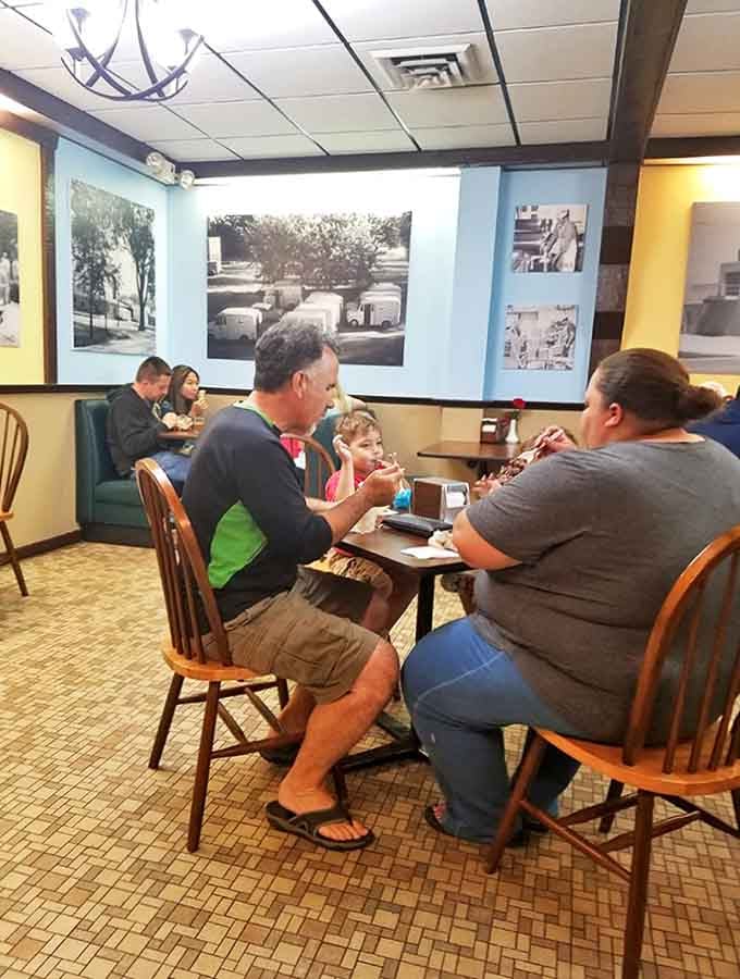 Inside Sherman's, where vintage charm meets ice cream paradise. Historic photos line the walls, telling sweet stories of generations past.
