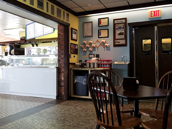 Step inside and time stands still &ndash; wooden chairs, vintage photos, and the promise of dairy delights await in this nostalgic haven.