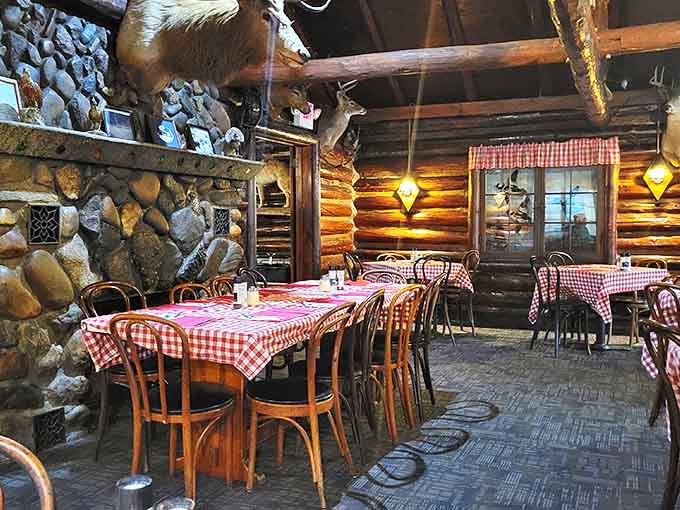 Step inside to a world where red-checkered tablecloths and mounted wildlife create the coziest Italian dining experience north of Rome.