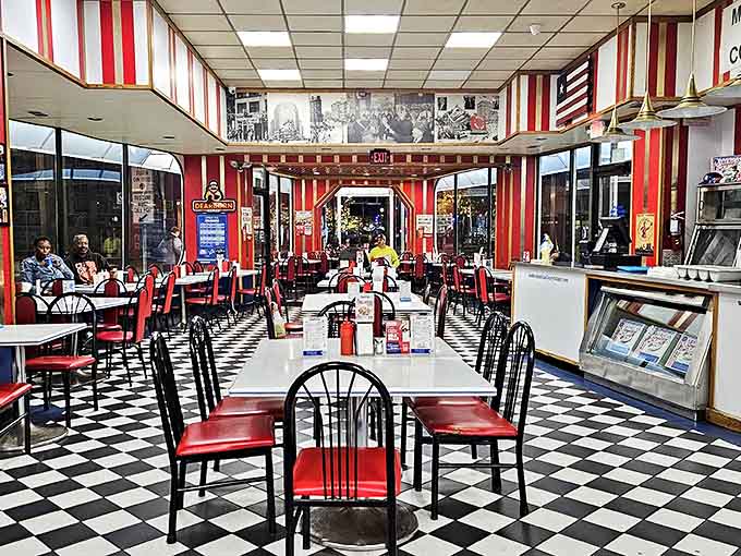 Step inside and travel back in time with the classic checkerboard floors, vintage memorabilia, and red vinyl seating that captures authentic diner nostalgia.