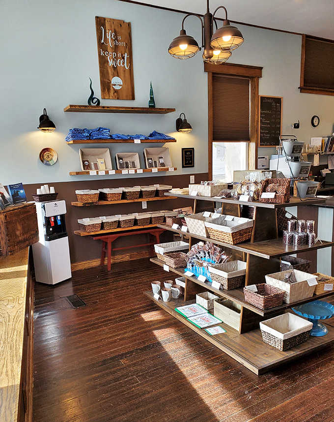 Step inside and witness the holy trinity of bakery perfection: warm wood, glass cases, and shelves lined with bread that makes store-bought loaves weep with inadequacy.