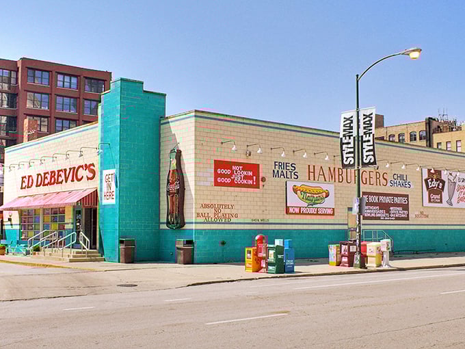 Ed Debevic's turquoise exterior pops against the Chicago skyline, promising a dining experience as colorful as its facade.