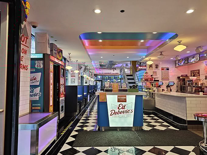 Step inside Ed Debevic's and feast your eyes on a neon wonderland where every detail screams 1950s, from the checkered floor to the retro counter.