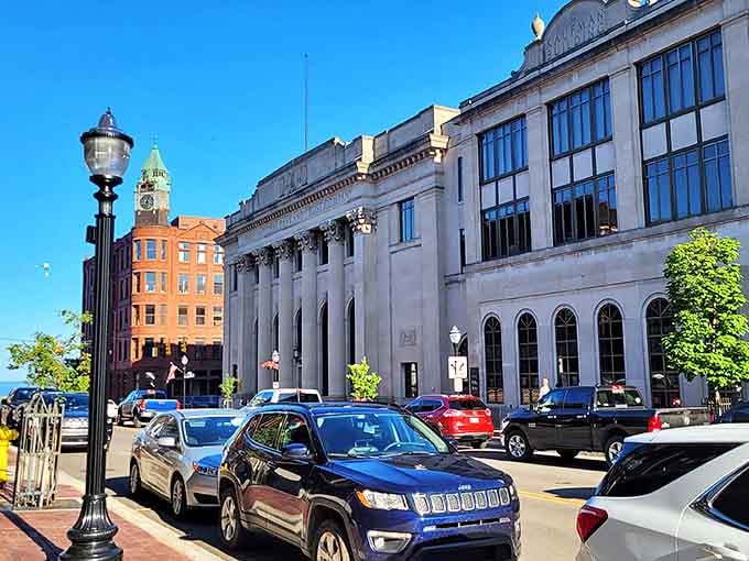 Marquette's historic architecture stands proud against the blue sky, with classic lamp posts lining streets that blend small-town charm with urban amenities.