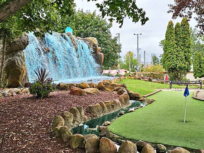 This isn't just decorative water &ndash; it's a strategic hazard disguised as a picturesque blue cascade that's swallowed countless wayward putts.
