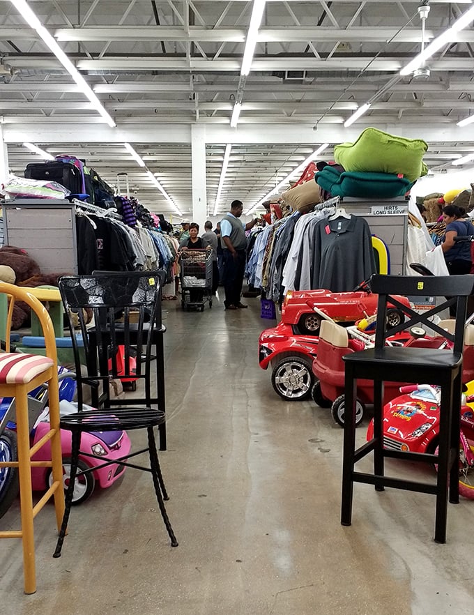 Dive into aisles that stretch like textile oceans, where yesterday's fashion finds new admirers and second chances.