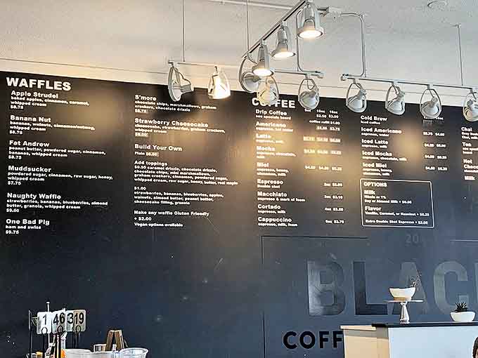 A blackboard of breakfast dreams, where every waffle possibility is spelled out like a choose-your-own-adventure for your taste buds.