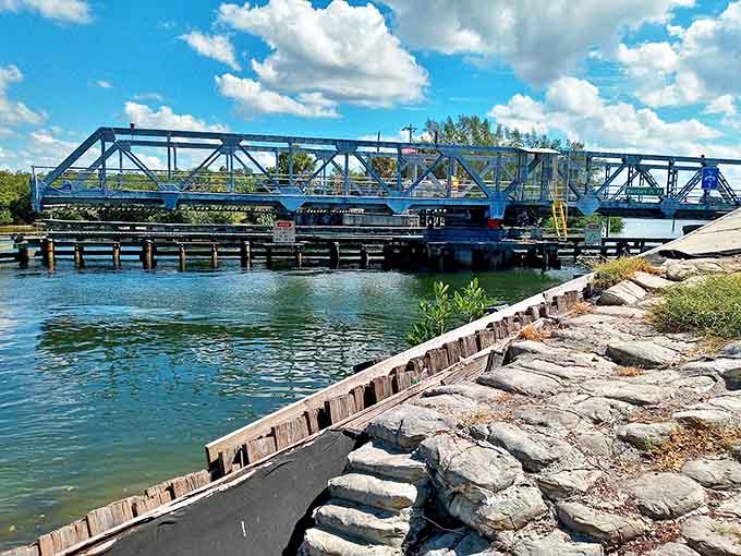 The historic Blackburn Point Swing Bridge stands as a charming sentinel, connecting mainland dreams to island realities.