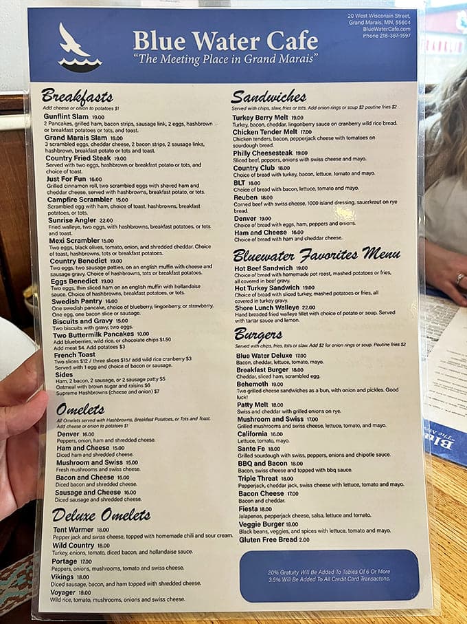 The menu board showcases an impressive array of waffle creations and coffee options, each one more tempting than the last.