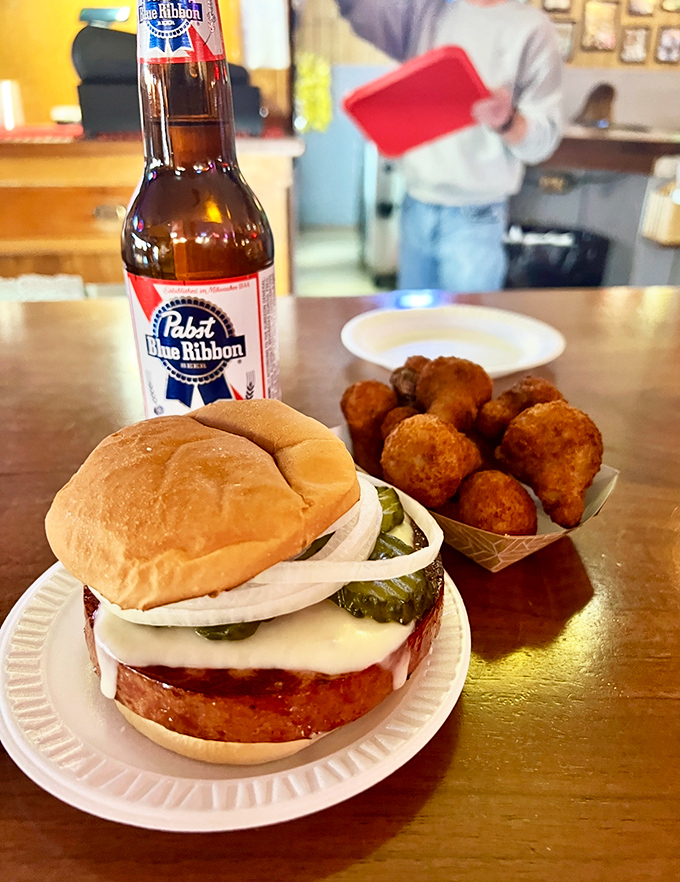 The legendary bologna sandwich arrives with perfectly caramelized edges, melty cheese, and tangy pickles on a soft bun &ndash; comfort food elevated to art form.