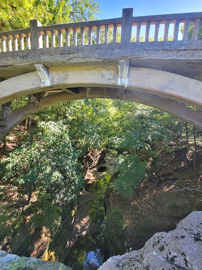 This century-old stone bridge stands as a sentinel over the canyon, offering views that make even the most jaded travelers pause in appreciation.