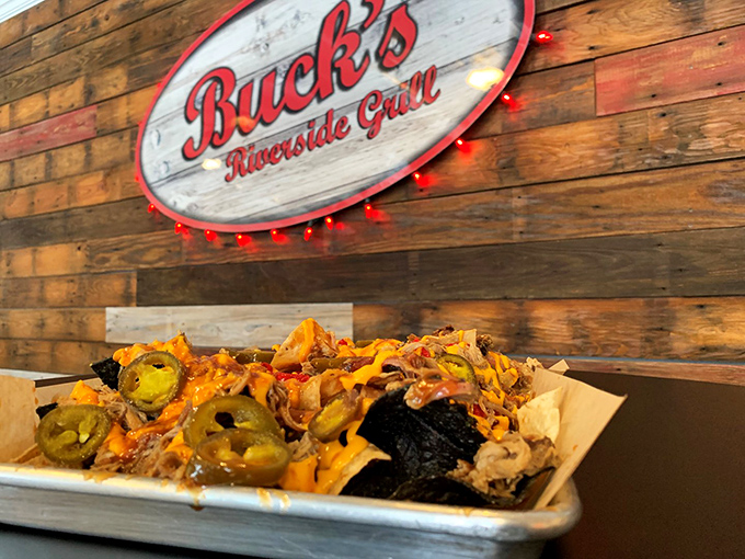 At Buck's Riverside Grill, loaded nachos aren't just a snack &ndash; they're an architectural achievement worthy of their own zip code.