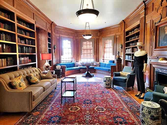 Butternut Room interior: Library goals that would make Belle from Beauty and the Beast swoon. Wood paneling never looked so sophisticated!