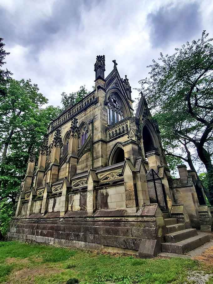 The Dexter Mausoleum rises like a Gothic cathedral in miniature, its stone presence both imposing and oddly comforting.
