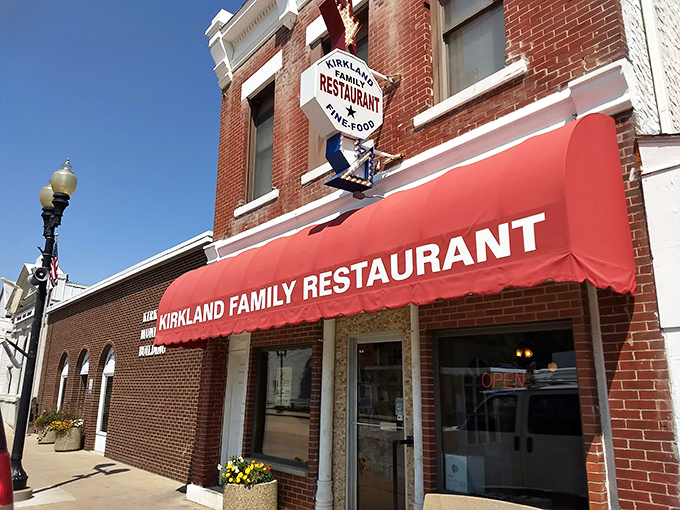 The Kirkland Family Restaurant serves up comfort without pretension. That red awning promises honest food that satisfies both hunger and nostalgia.