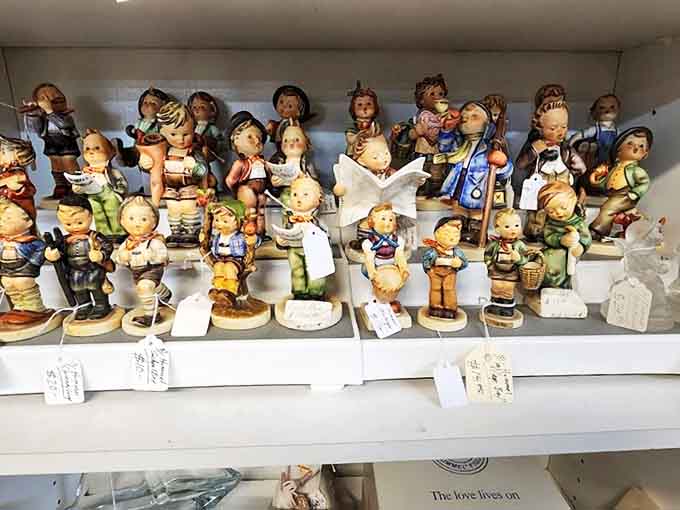 An army of cherubic faces frozen in time, these Hummel-style figurines represent collectibles that grandmothers everywhere would recognize instantly.