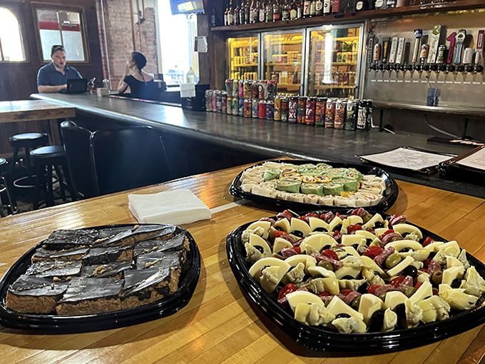 Shareable platters of sandwiches and charcuterie provide one-handed fuel for serious gamers who refuse to abandon their high-score quests.