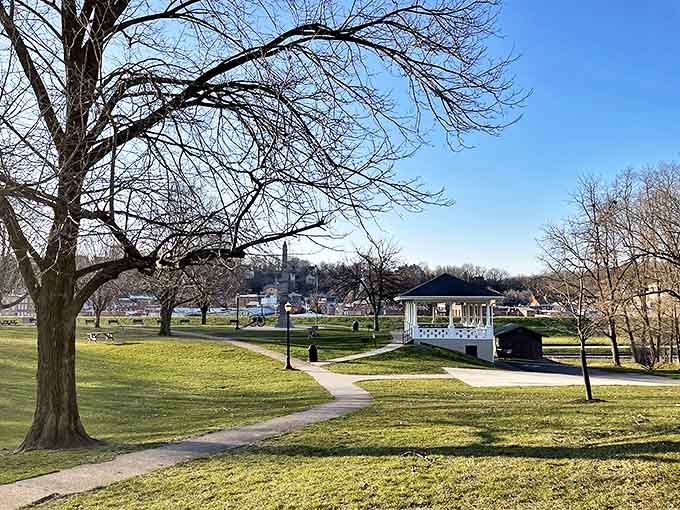 Grant Park offers a peaceful respite where the gazebo stands like a Victorian sentinel watching over generations of visitors.