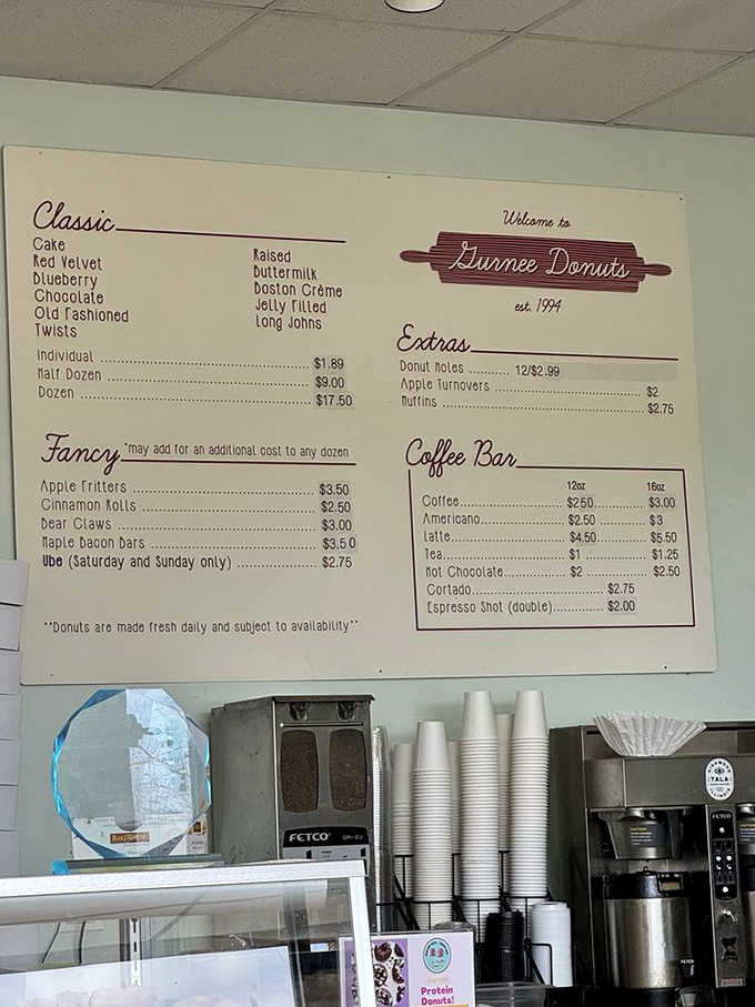 When a menu board lists "Ube (Saturday and Sunday only)," you know you've found a place that takes its donut game seriously beyond the basics.