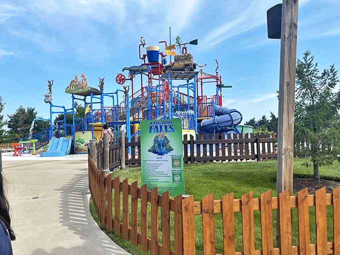 This multi-level aquatic playground stands like a water-soaked fortress where little adventurers conquer slides and dodge the infamous tipping bucket.