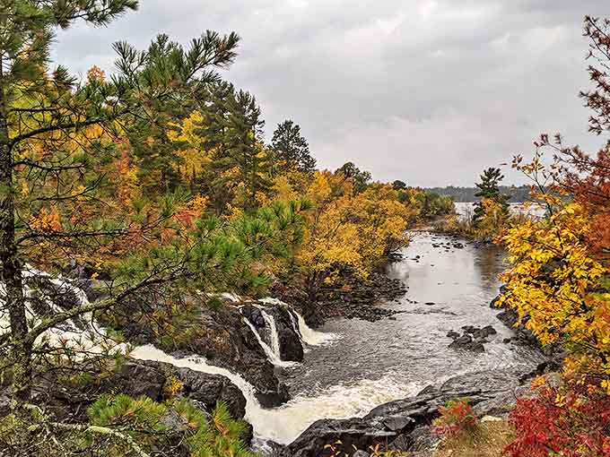 Kawishiwi Falls showcases nature's raw power, with rushing waters carving through ancient rock in a display that's both soothing and exhilarating.