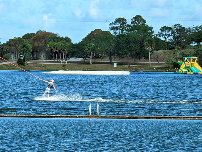 Perfect glassy conditions await wakeboarders as the Florida sun creates a mirror-like surface for riders to carve their liquid signatures.