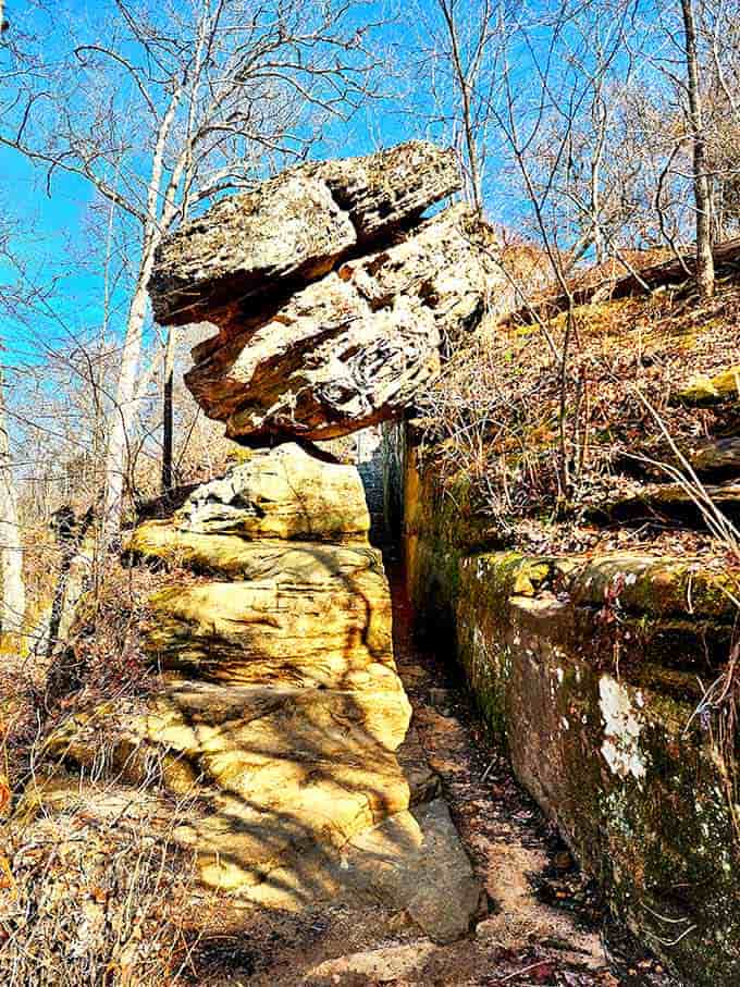 This precariously balanced boulder has been defying gravity for millennia, making your balancing act with the checkbook seem less impressive.