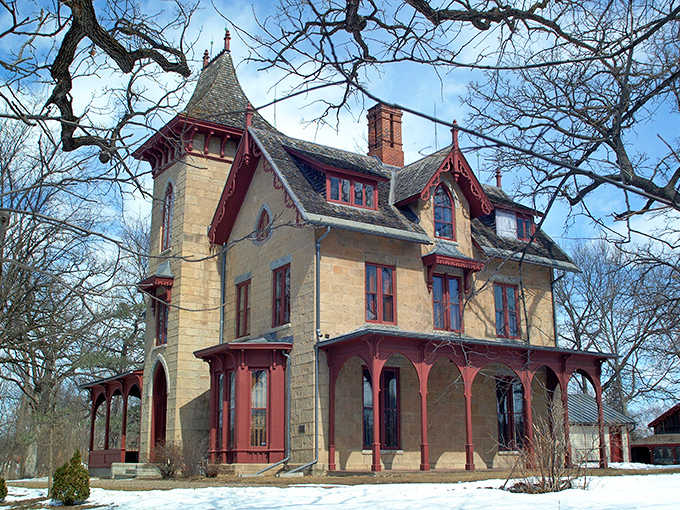 Even in winter's embrace, the LeDuc mansion maintains its dignified charm, like a distinguished gentleman who refuses to let a little snow ruin his composure.