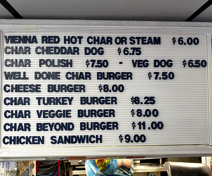 Simple yet perfect &ndash; the menu board showcases Chicago classics from Vienna Beef hot dogs to char burgers, each promising char-grilled excellence.