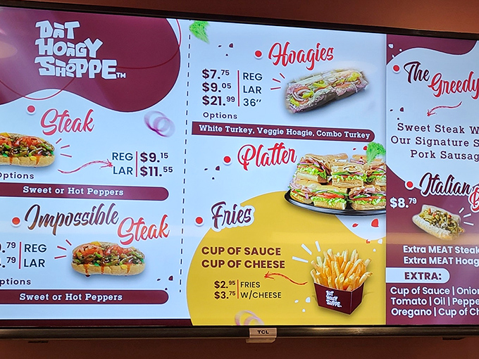 Decisions, decisions! The menu board showcases everything from their famous donuts to savory hoagies from neighboring Uncle John's.