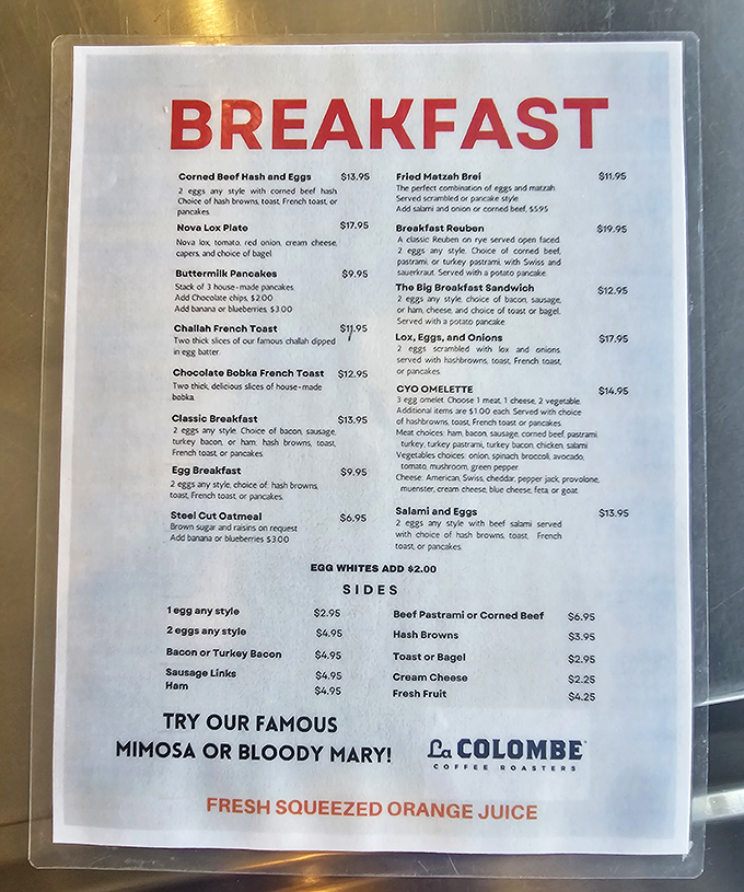 The breakfast menu reads like a love letter to morning hunger, with challah French toast and corned beef hash stealing the spotlight.