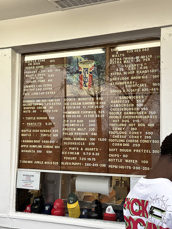 The legendary menu board – a masterpiece of temptation that's witnessed decades of wide-eyed customers pointing excitedly at their frozen destiny.