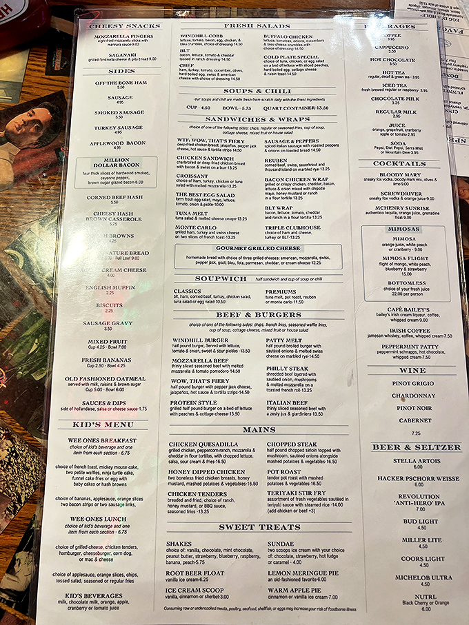 The extensive menu offers everything from classic breakfast favorites to hearty lunch options, all delivered with locomotive flair.