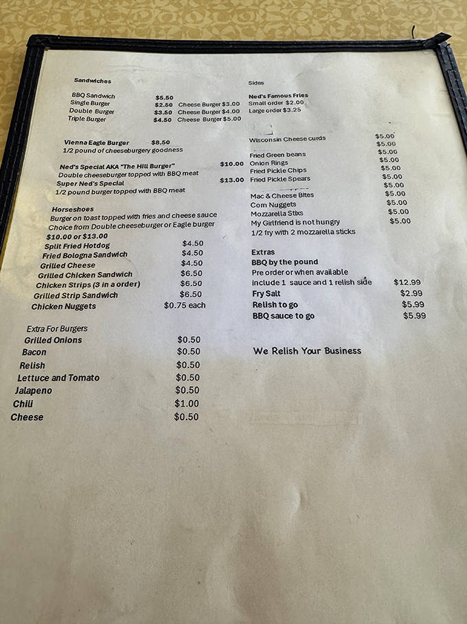 The menu unfolds like a greatest hits album of American drive-in classics, each item promising comfort and satisfaction without pretension.