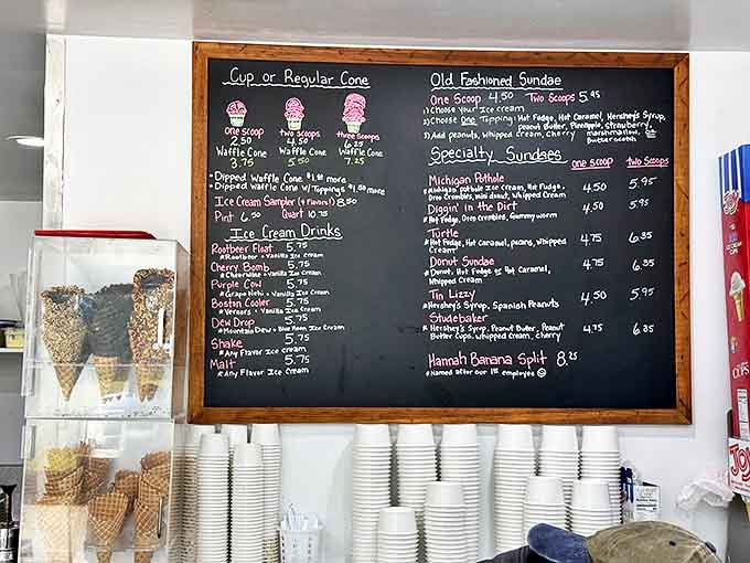 This isn't just a menu – it's a roadmap to happiness written in chalk, where decisions between Michigan Pothole and Peach in the Dirt become life's biggest dilemmas.