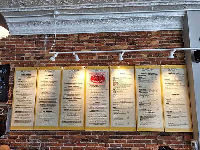 The menu board stretches across the wall like a roadmap to culinary bliss, promising adventures in flavor without requiring a passport.