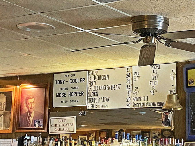 Hanging proudly above the bar, this handwritten menu board showcases classics like the Tony-Cooler and the legendary Mose Hopper cocktail.