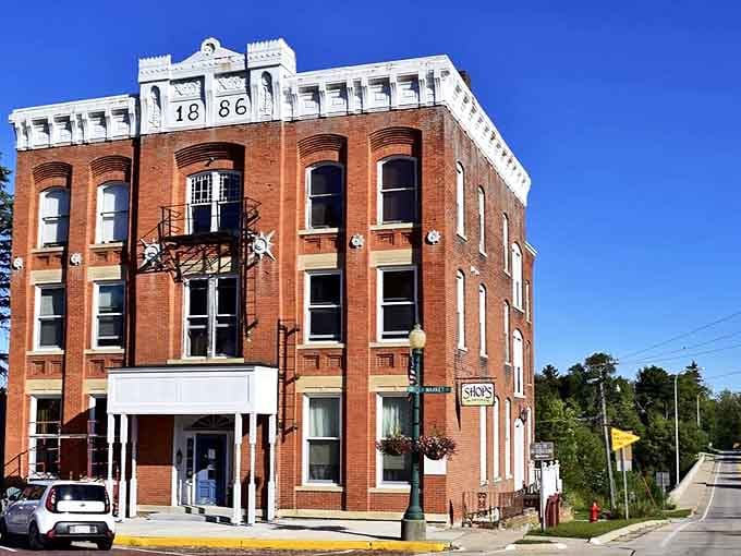 This historic hotel building, marked with "1886," has witnessed over a century of travelers passing through Mount Carroll's charming streets.