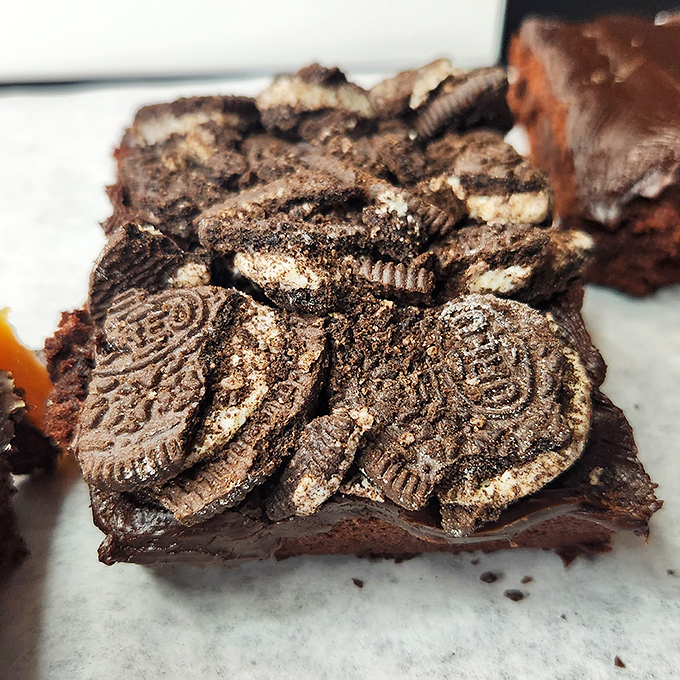 Oreo Brownie: Chocolate nirvana achieved! Chunks of America's favorite cookie swimming in fudgy decadence &ndash; diet plans beware of this beauty.
