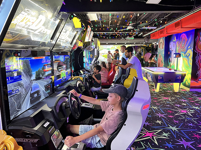 The racing game row transforms friendly outings into competitive showdowns &ndash; nothing says "I love you" like leaving your buddy in digital dust.