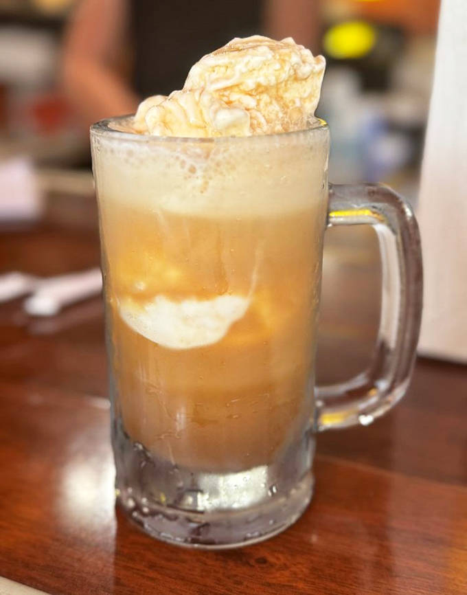 The crown jewel of John's offerings: a root beer float with vanilla ice cream creating that perfect creamy foam that makes time stand still.