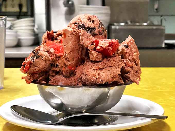 This isn't just ice cream – it's a mountain of homemade decadence that makes modern, precisely-portioned scoops look like sad little imposters.