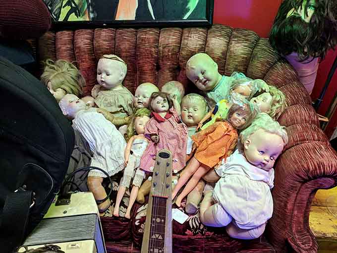 These vintage dolls have seen some things over the years, and they're not telling, though their slightly unsettling expressions suggest interesting stories.