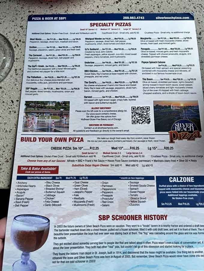 The menu showcases creative specialty pizzas with local connections, from the Whirlpool Wonder to the BBQ Chicken masterpiece.