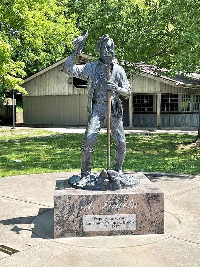 Young Lincoln the surveyor stands immortalized, reminding visitors that presidents start somewhere, usually measuring property lines in frontier Illinois.