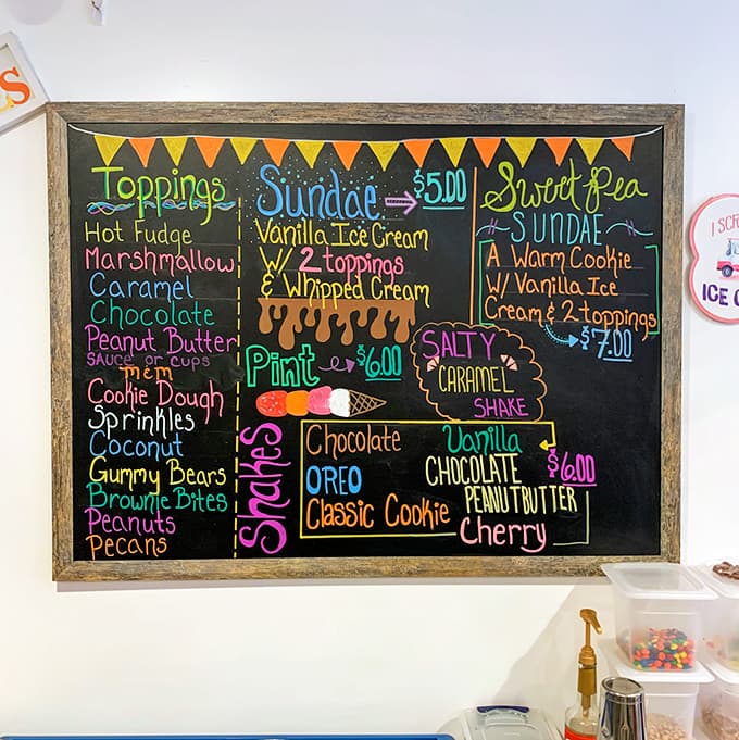 A rainbow explosion of options awaits on the menu board &ndash; from classic sundaes to signature shakes, each promising its own sweet symphony.