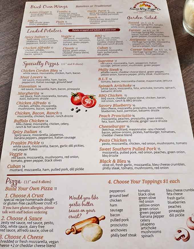 Decision paralysis has never been so delicious! The menu at Tawas Bay Pizza Co. offers everything from classic combinations to adventurous flavor journeys.